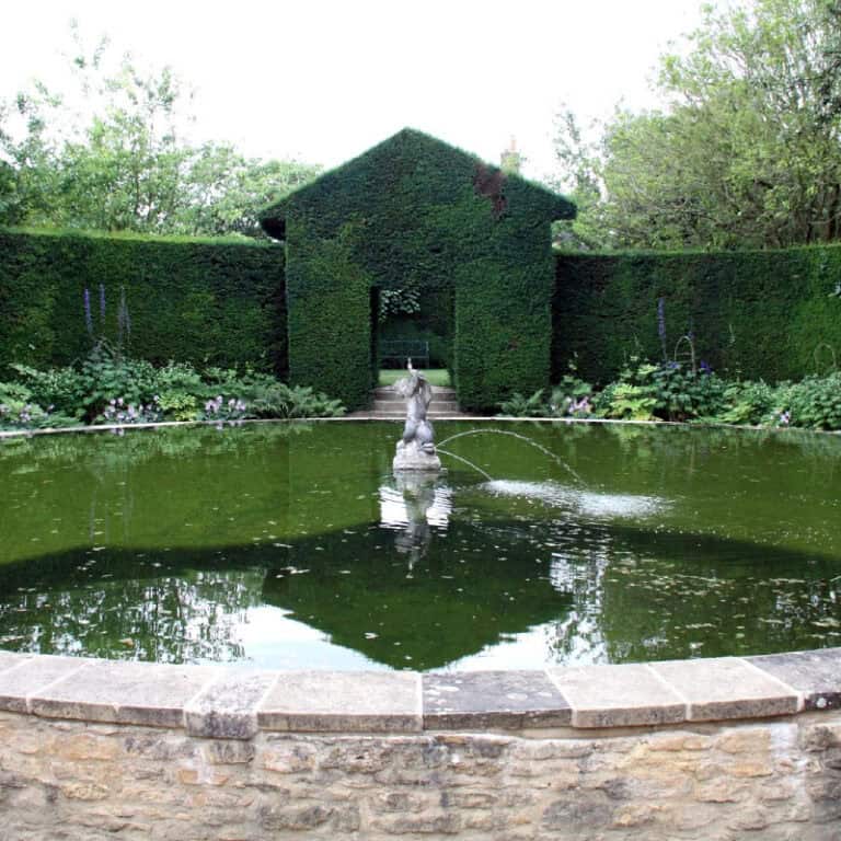 20 Raised Koi Pond Designs (Get Inspired) - Pond Informer